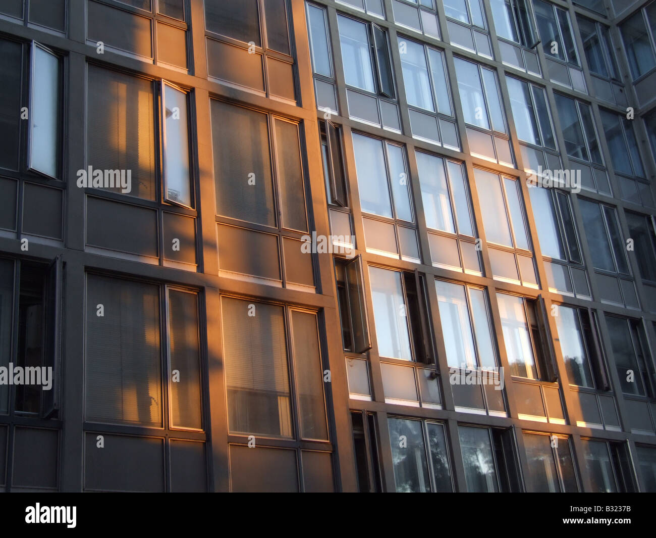 detail of office block facade windows in sun light Stock Photo - Alamy