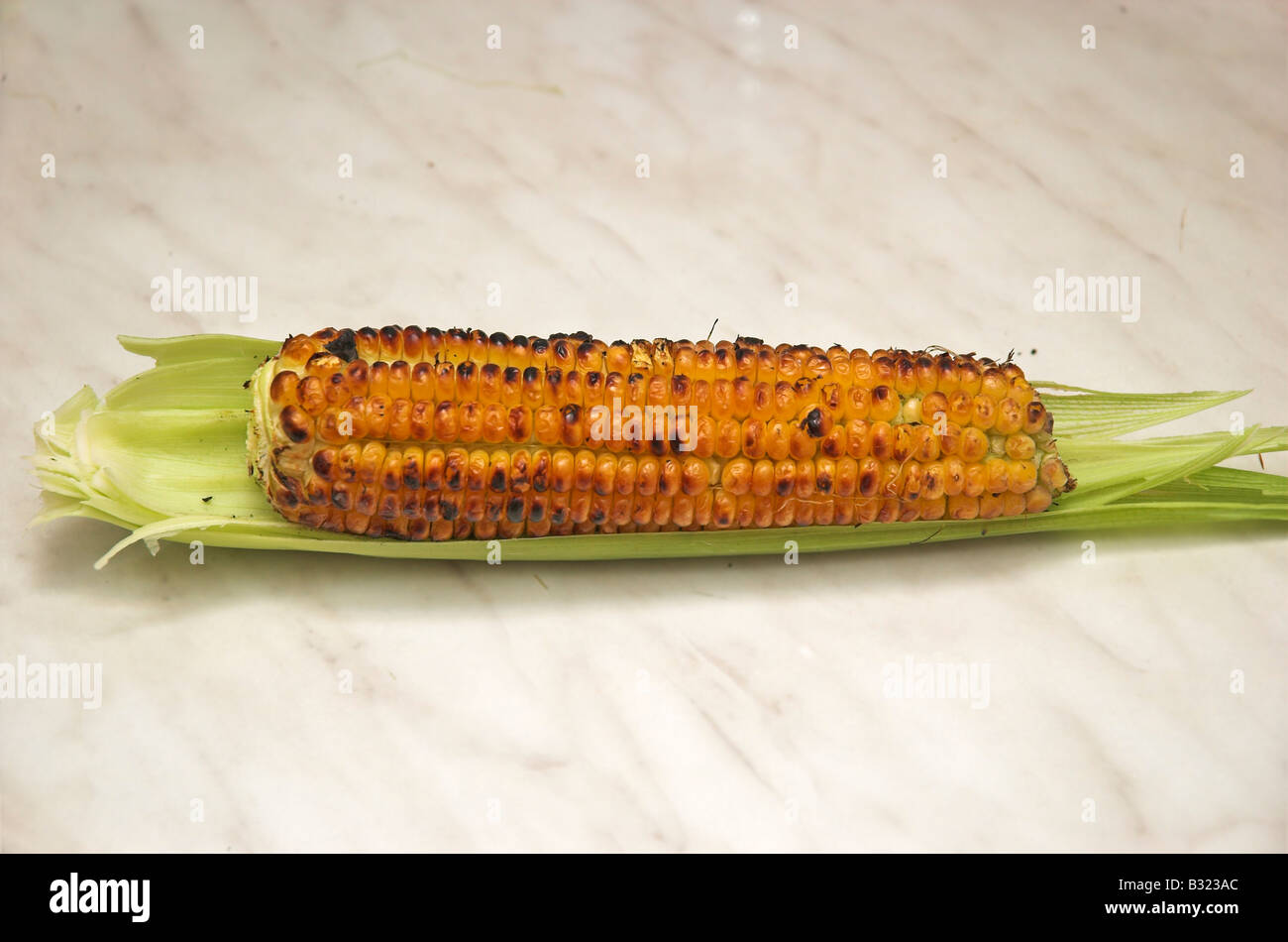 Ears of grilled corn on the cob Stock Photo - Alamy