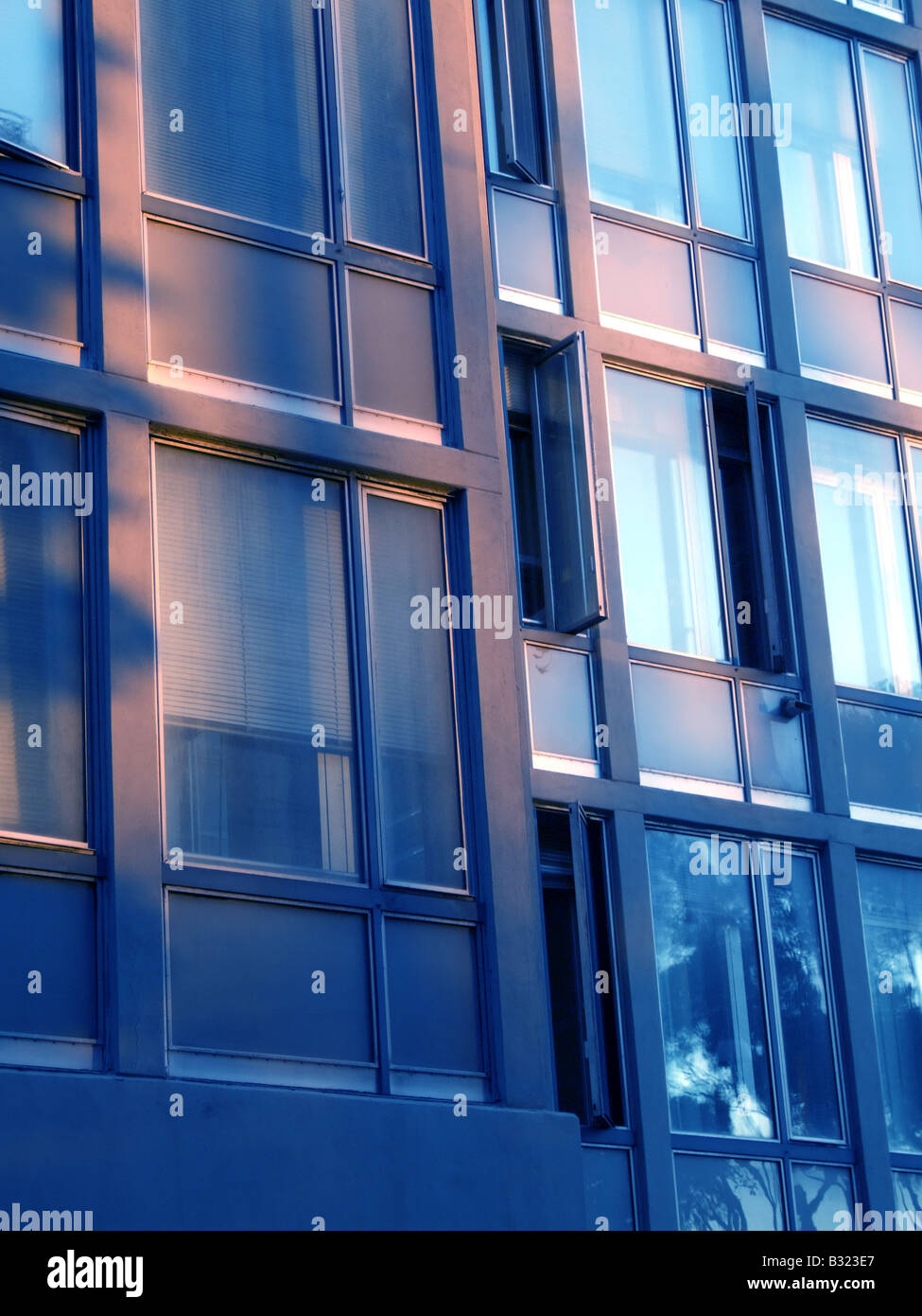 detail of office block facade windows in sun light Stock Photo - Alamy
