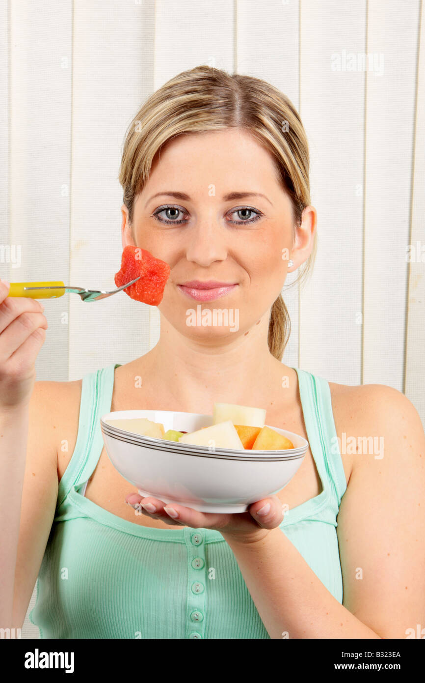 Young Woman Eating Fruit Salad Model Released Stock Photo - Alamy Young Woman Eating Fruit Salad Model Released Stock Photo - Alamy