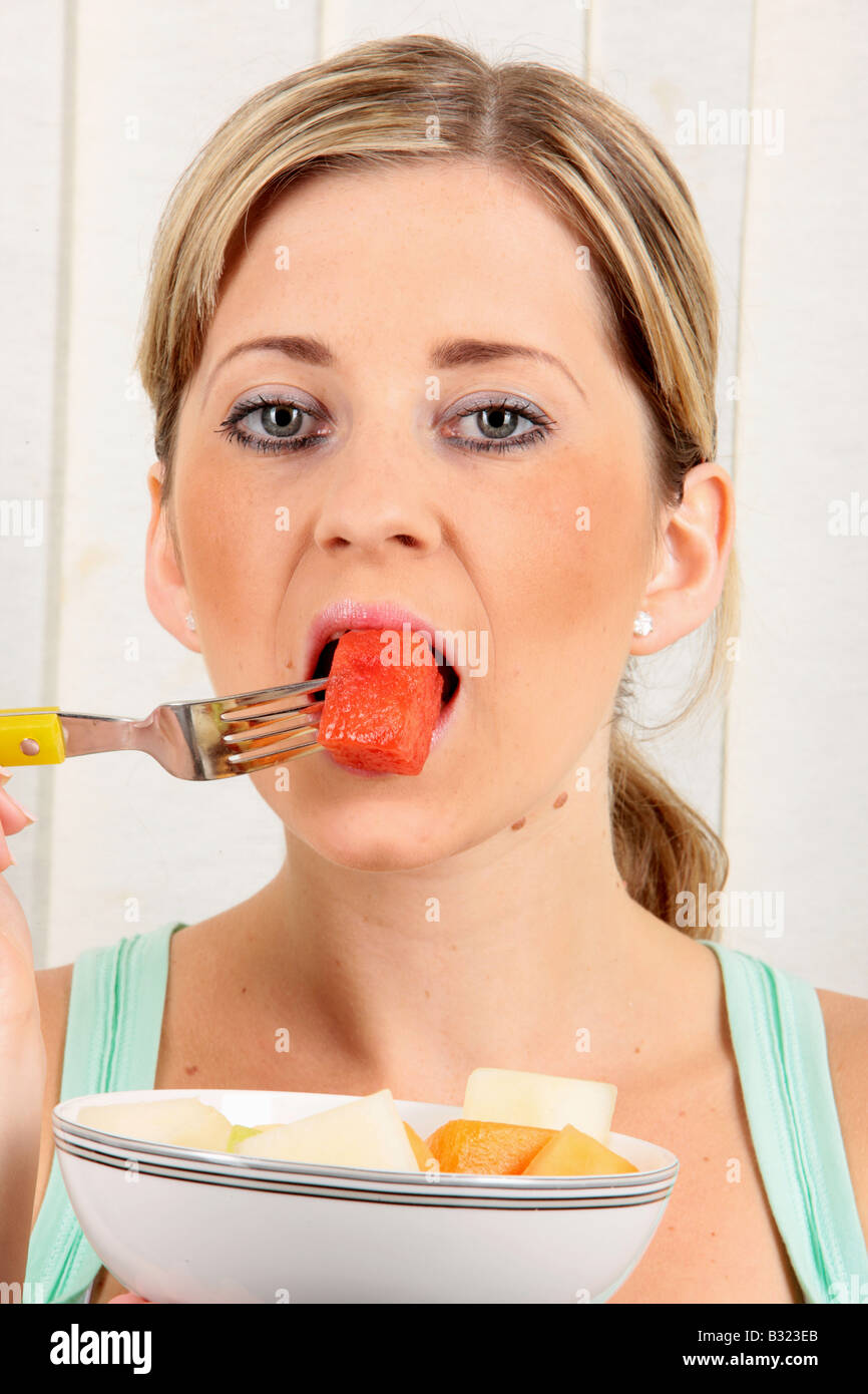 Young Woman Eating Fruit Salad Model Released Stock Photo - Alamy Young Woman Eating Fruit Salad Model Released Stock Photo - Alamy