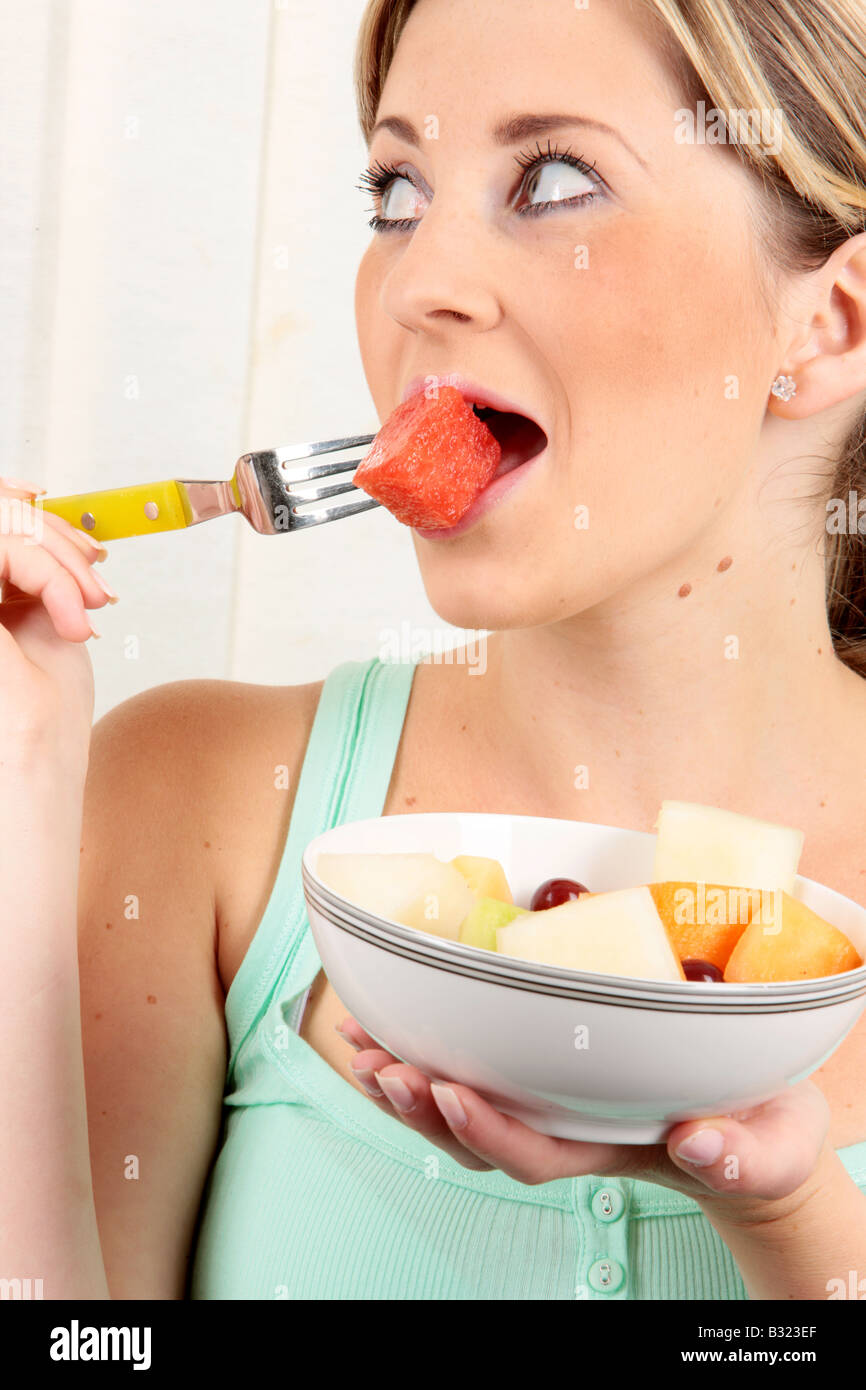 Young Woman Eating Fruit Salad Model Released Stock Photo - Alamy Young Woman Eating Fruit Salad Model Released Stock Photo - Alamy