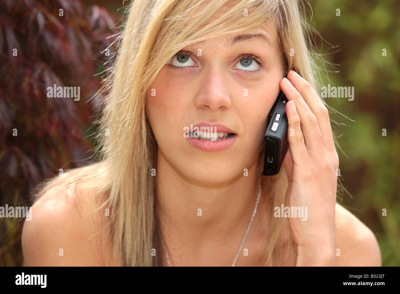 Young Woman Using Mobile Phone Model Released Stock Photo - Alamy