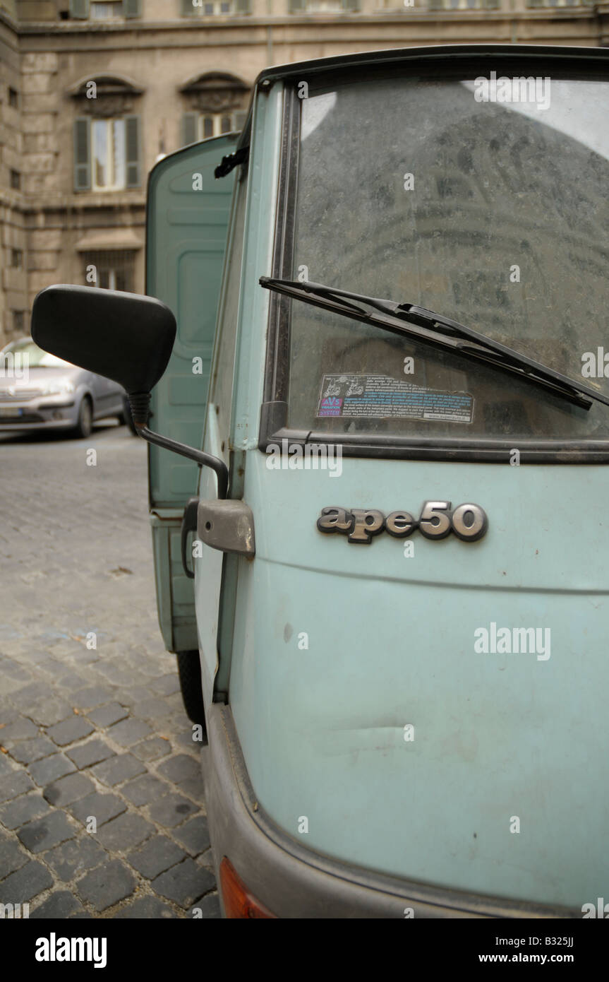 Piaggio Ape three-wheeled van parked in Via Del Pie'di Marmo, central ...