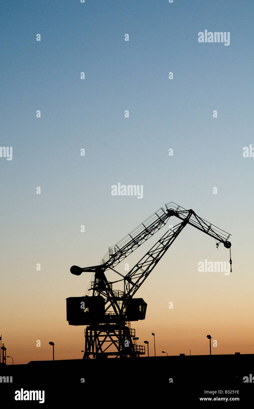 crane leverage dockyard loading unloading shipping Stock Photo - Alamy