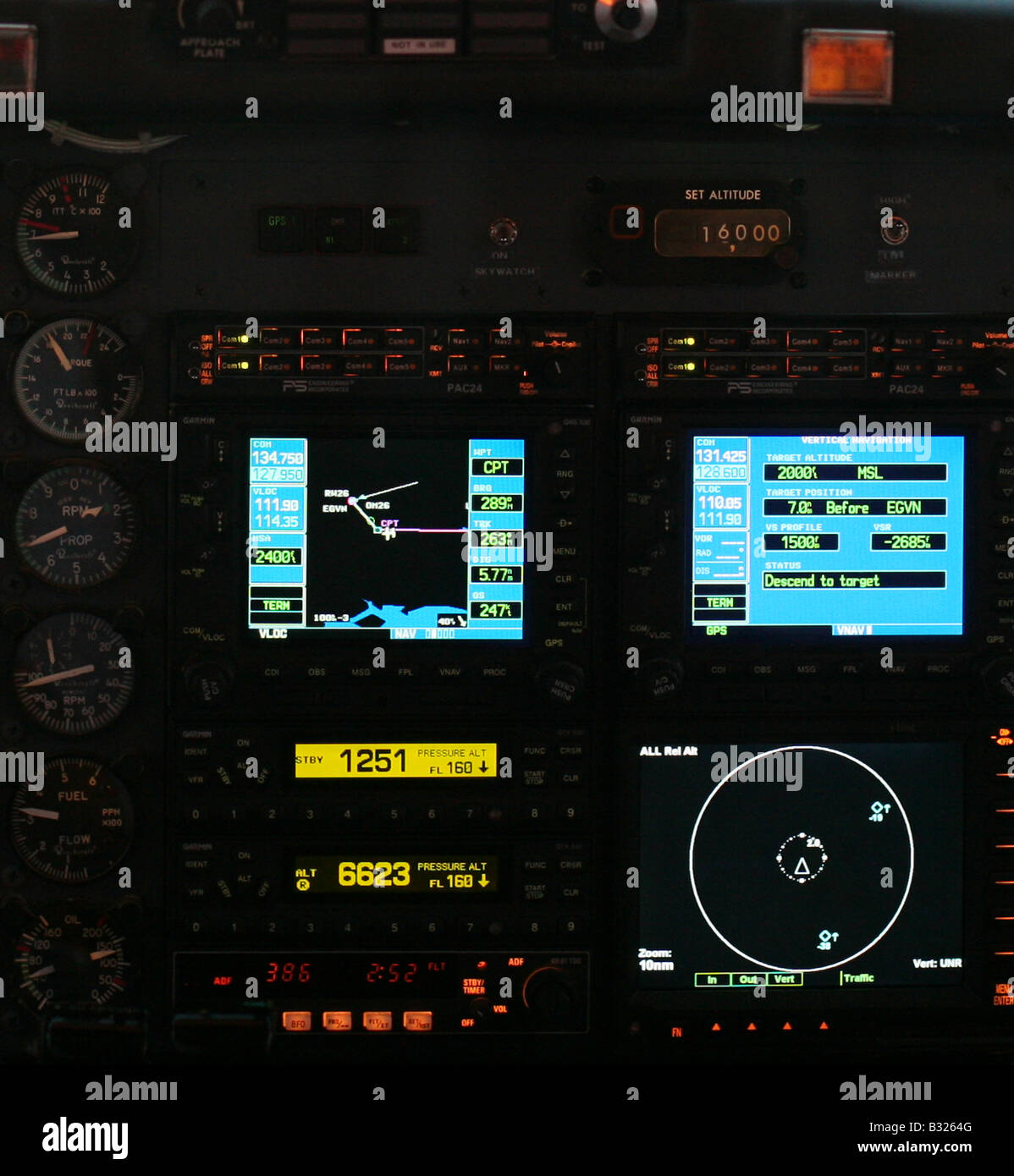 Pilots use their instruments in the cockpit of a small prop plane Stock ...