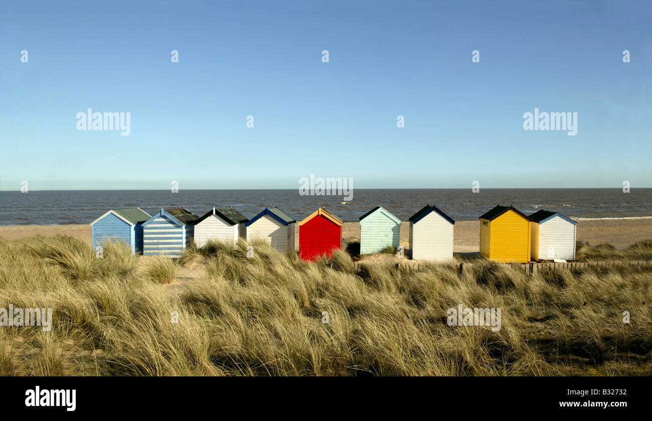 Colorful beach huts including the colors of blue red yellow and white ...