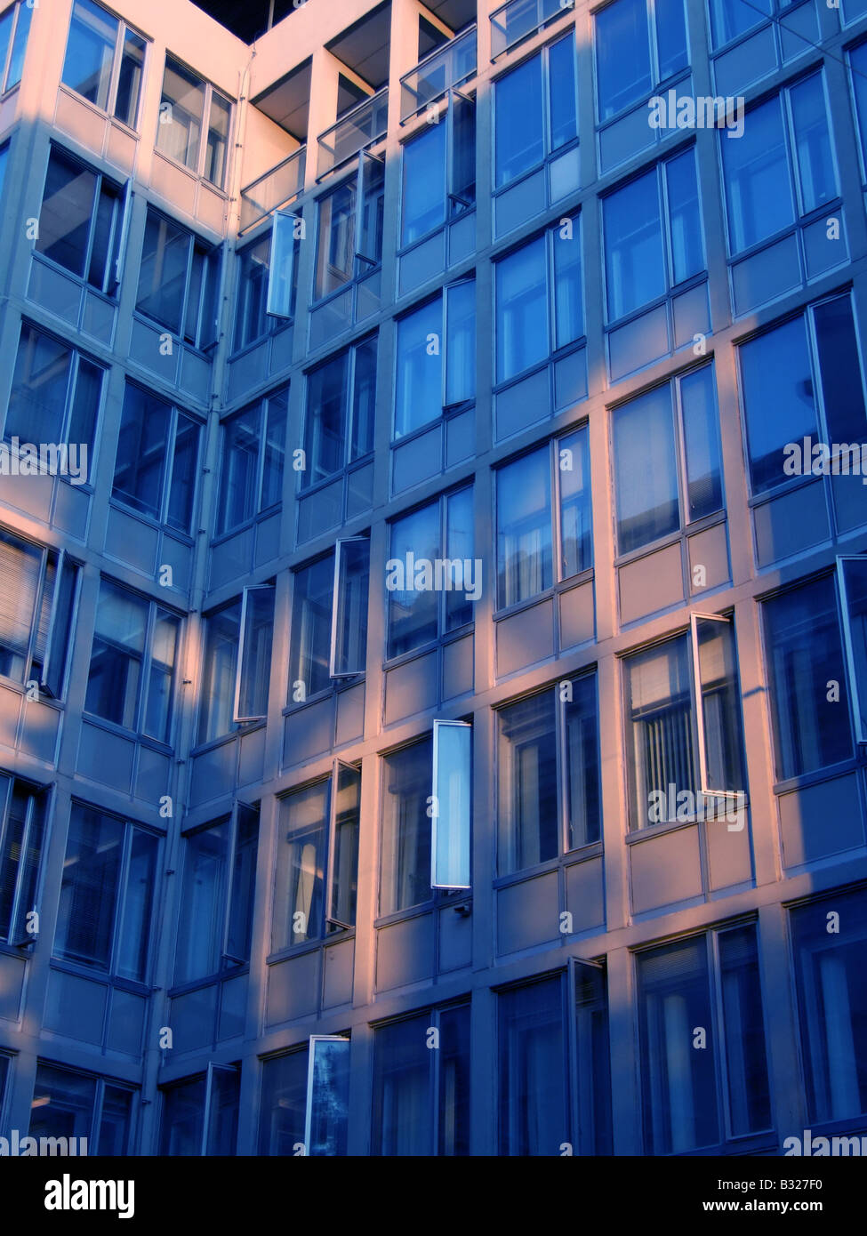 detail of office block facade windows in sun light Stock Photo - Alamy