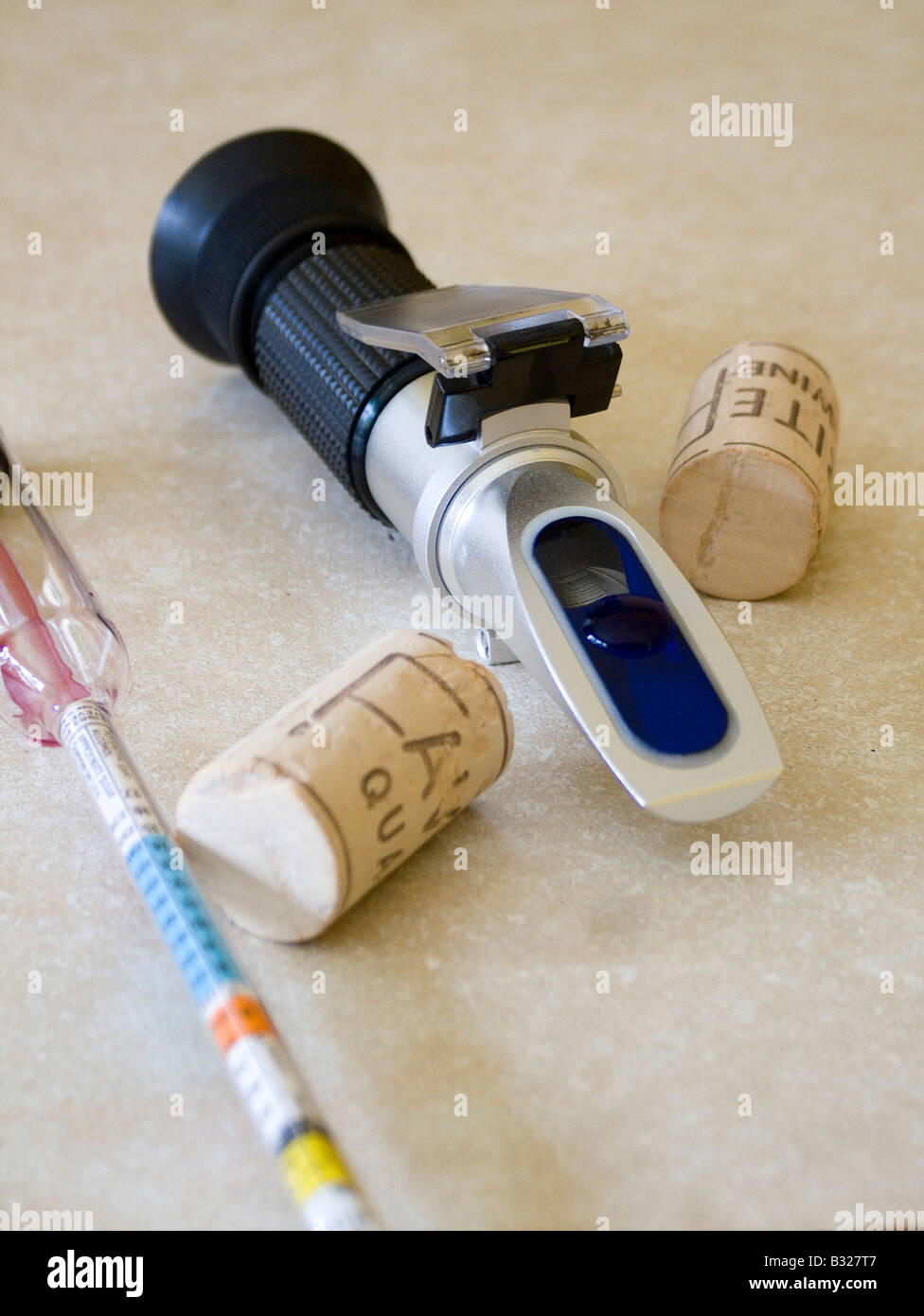 Home wine making with a hydrometer and a refractometer Stock Photo - Alamy