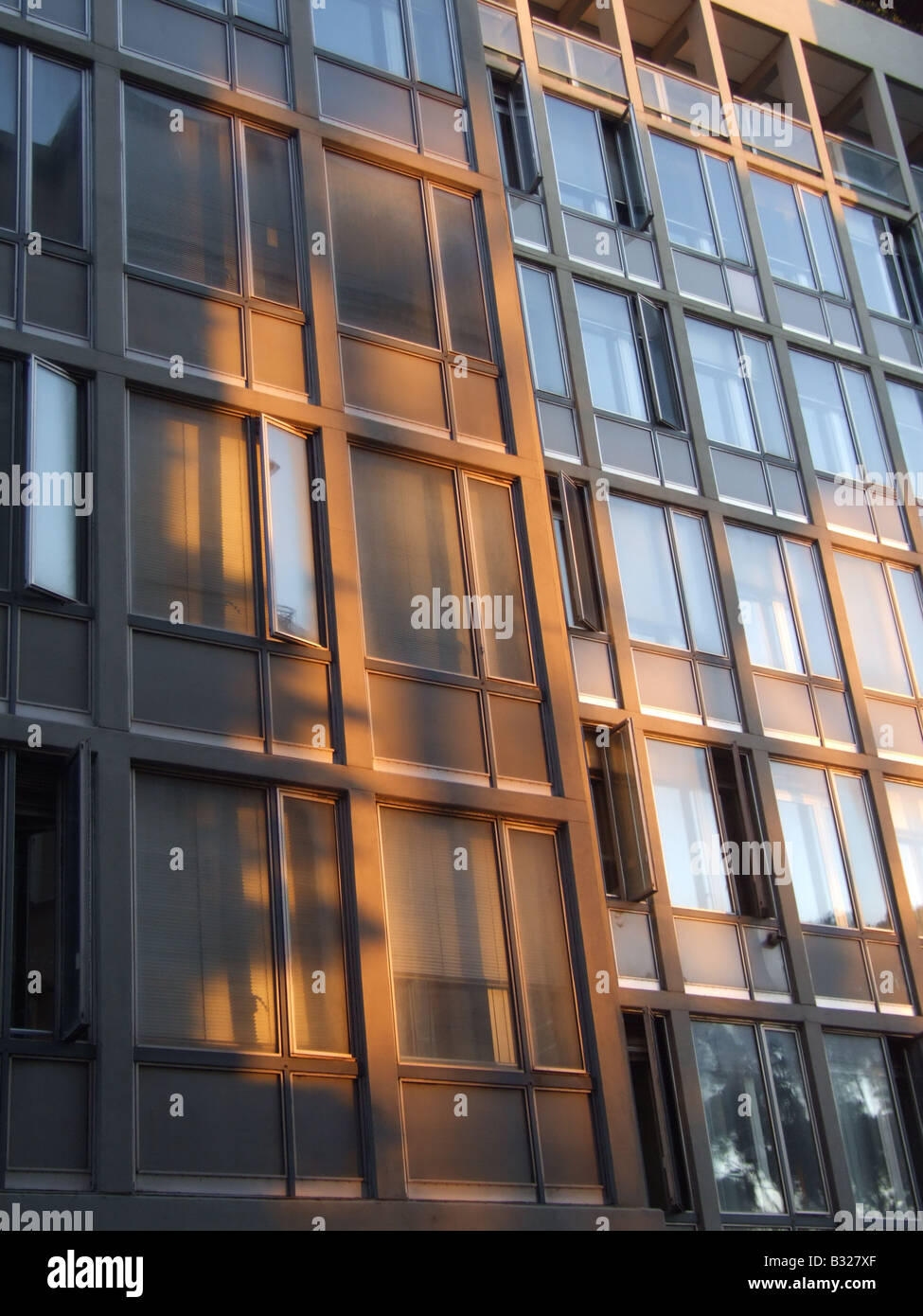 detail of office block facade windows in sun light Stock Photo - Alamy