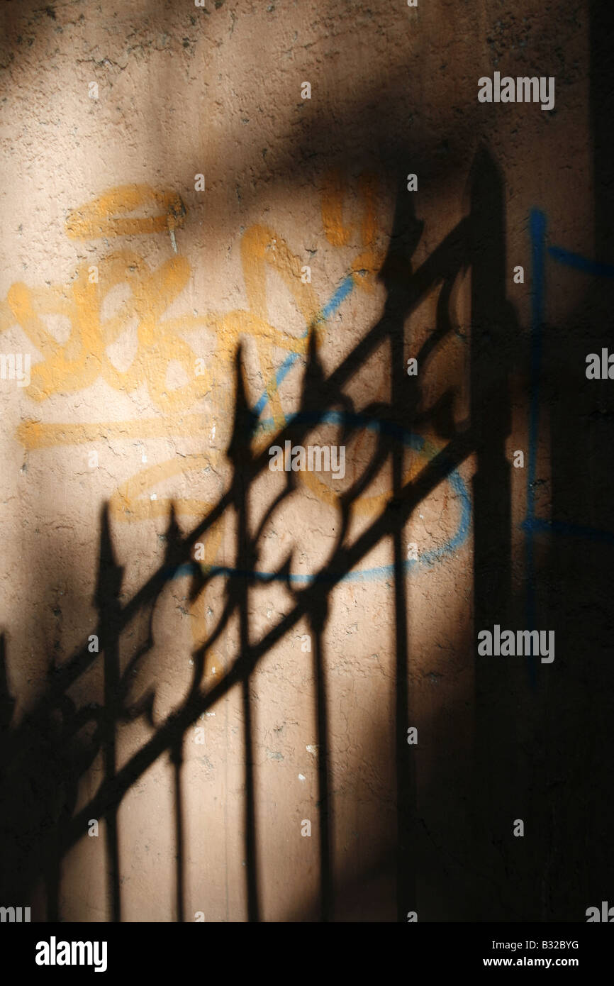 abstract gate fence shadow graffiti wall outdoors Stock Photo - Alamy