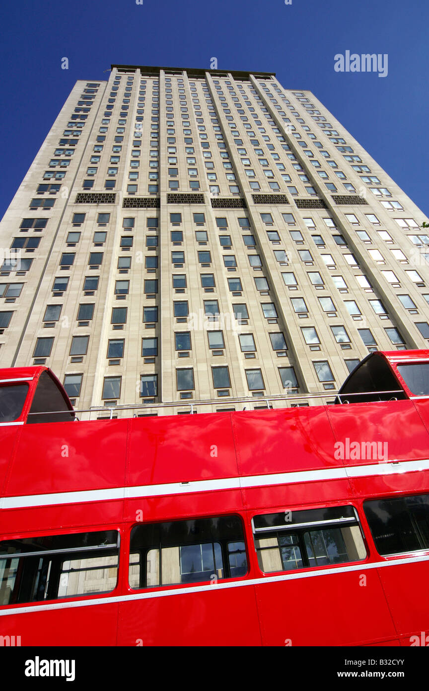 Traditional red double-decker in front of tall skyscraper. London Stock ...
