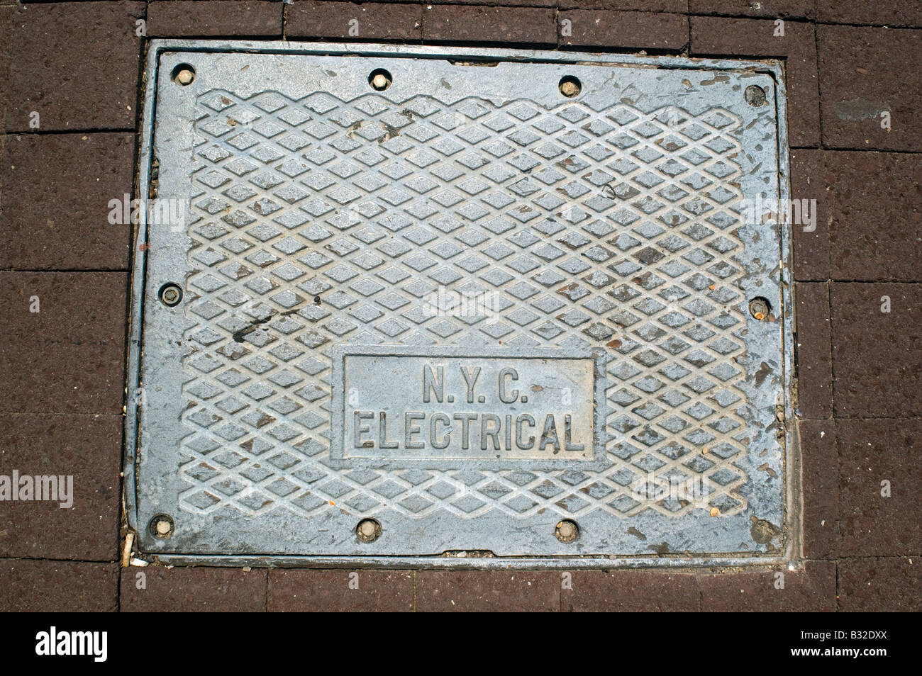 Close up an electrical manhole cover Stock Photo, Royalty Free Image ...