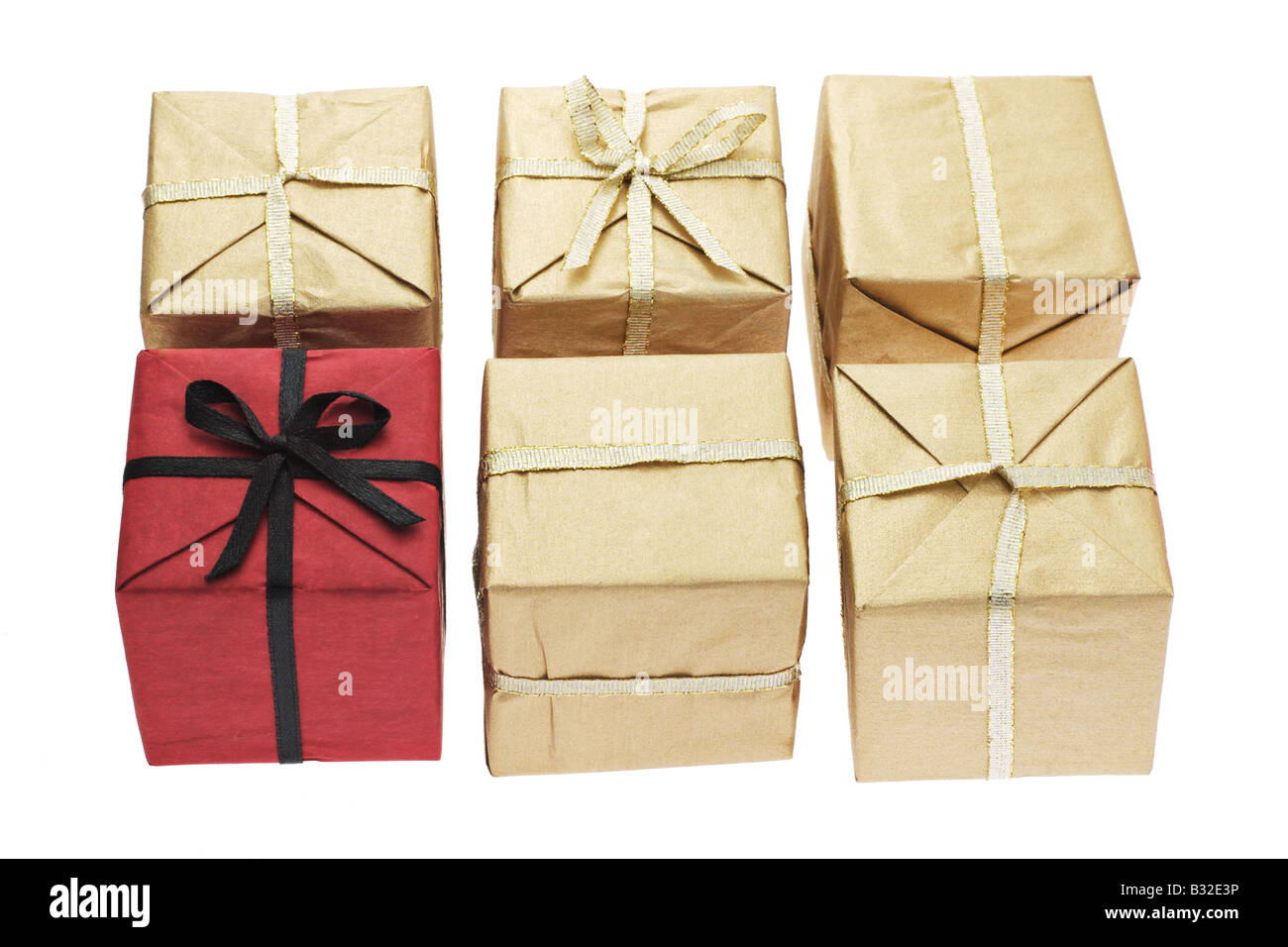 Red color gift box alone among brown boxes on white background Stock ...