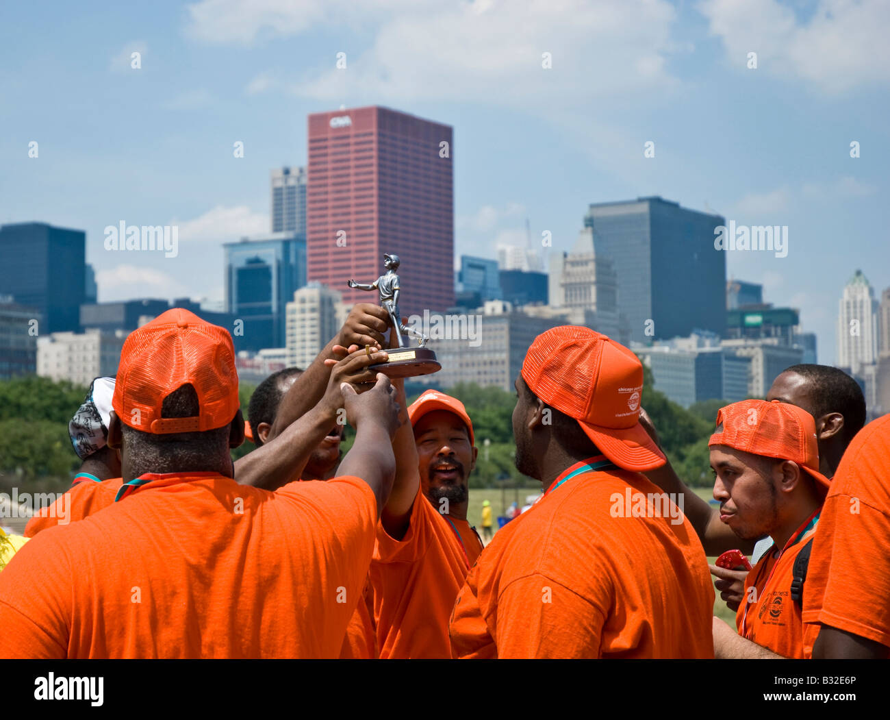 A team raises their trophy in celebration at a Special Olympics ...