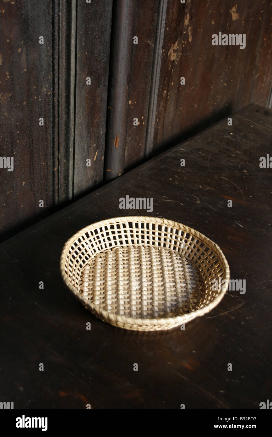 offering dish on table in church, italy Stock Photo - Alamy
