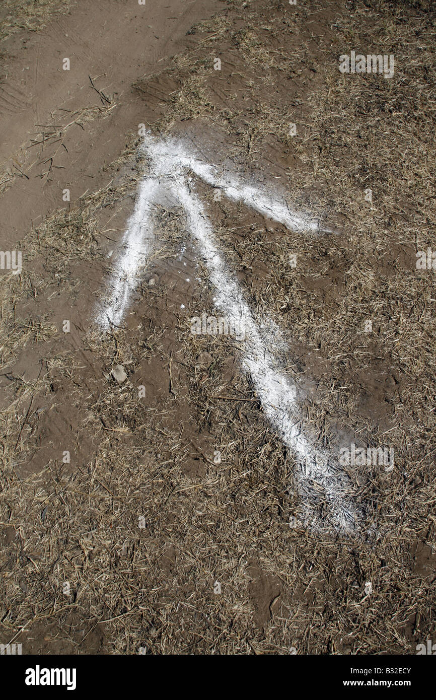 temporary chalk arrow on earth ground in field Stock Photo - Alamy