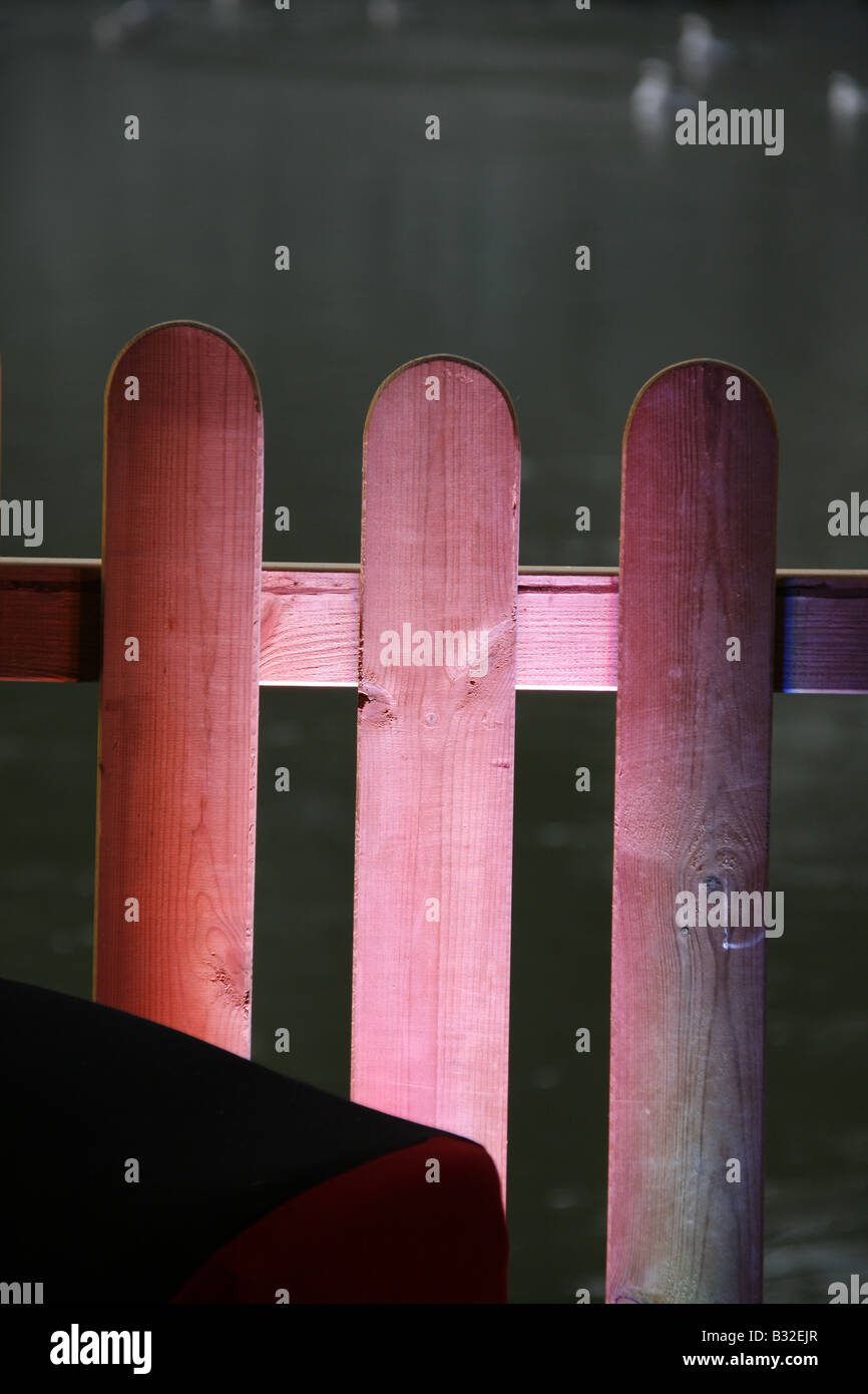 one wooden gate fence illuminated night outdoors Stock Photo - Alamy