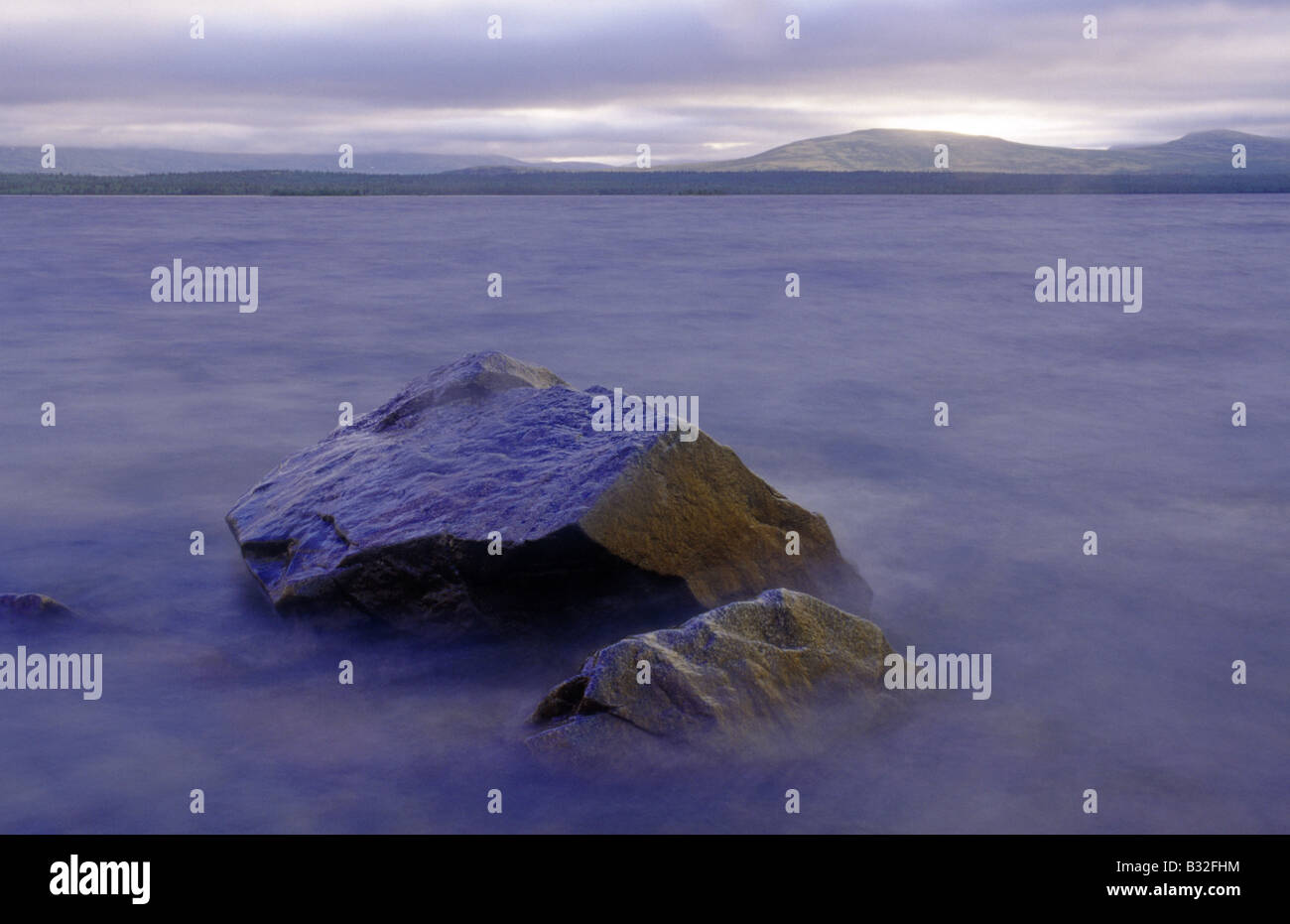 Night Sunset sunrise on lake Stones rocks Ice Thick mist rising ...