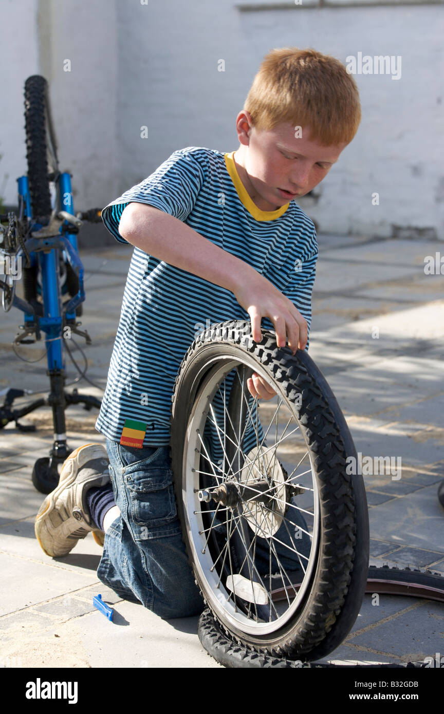 Mend puncture hi-res stock photography and images - Alamy