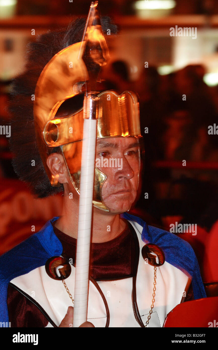 A man wearing an ancient roman soldier costume during a catholic ...