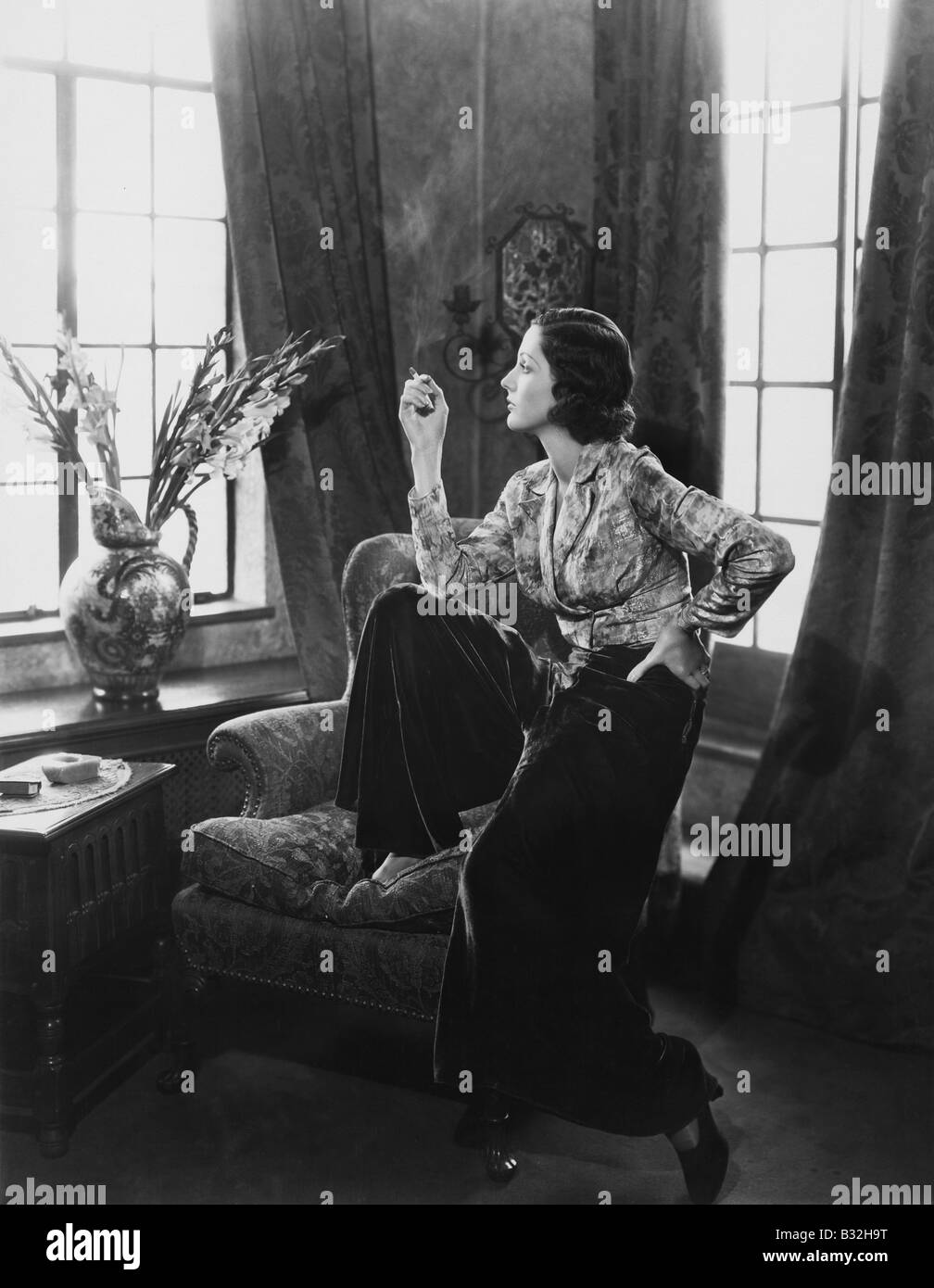 Woman lounging around hi-res stock photography and images - Alamy