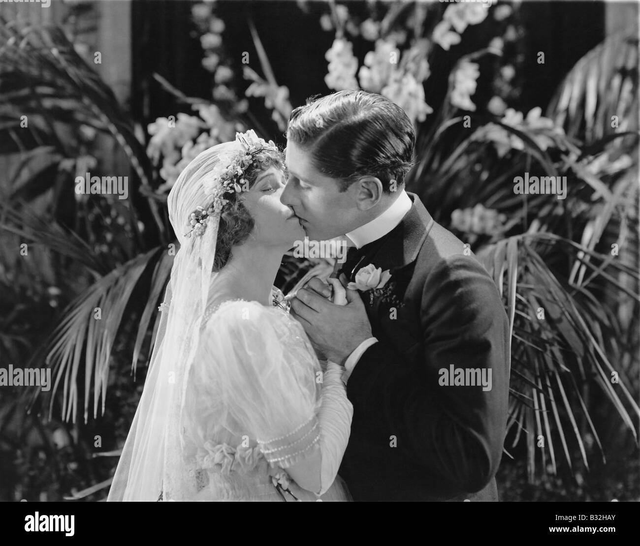 Bride kisses Black and White Stock Photos & Images - Alamy