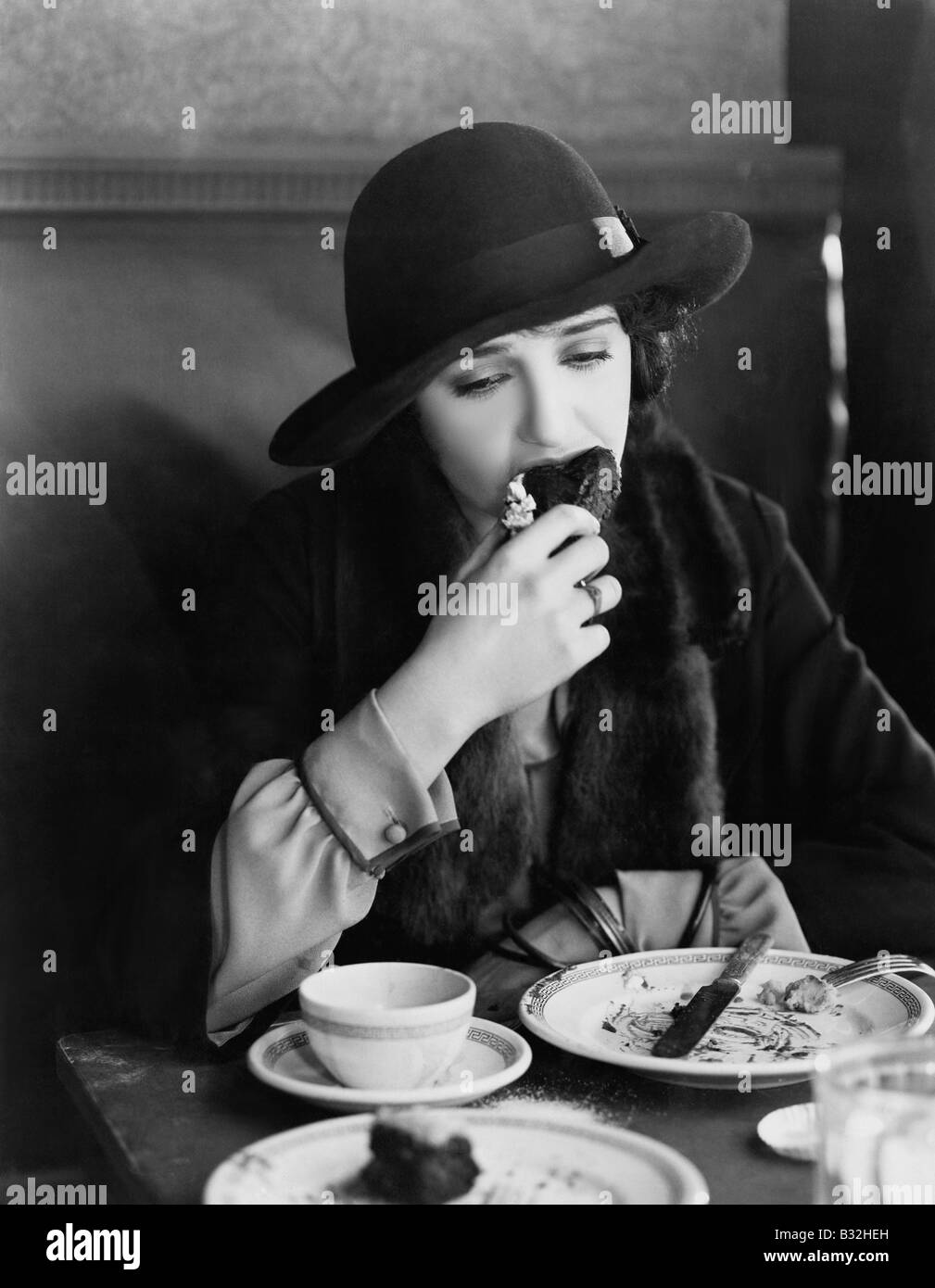 Retro eating cake Black and White Stock Photos & Images - Alamy