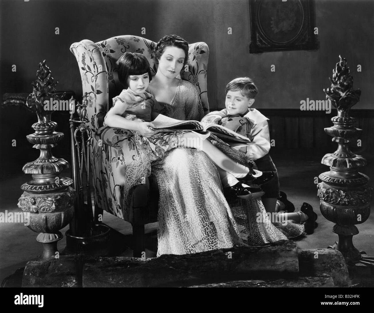Brother sister reading bedtime story hi-res stock photography and ...