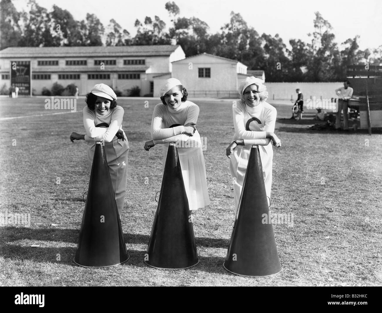 Smiling young female team Black and White Stock Photos & Images - Alamy