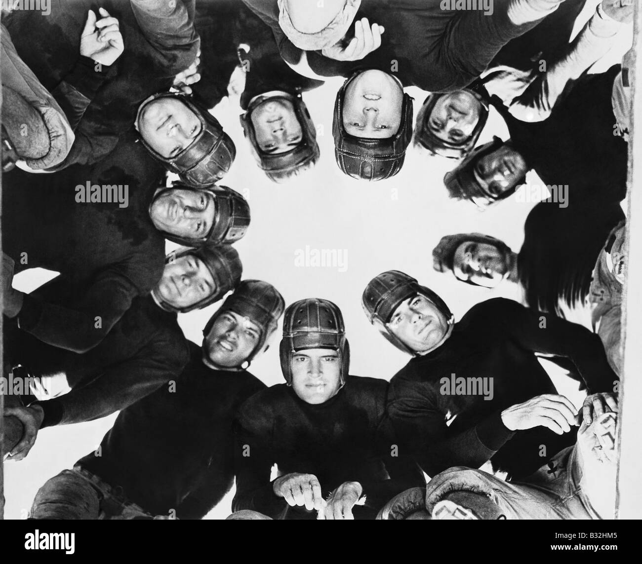 Huddle Black and White Stock Photos & Images - Alamy