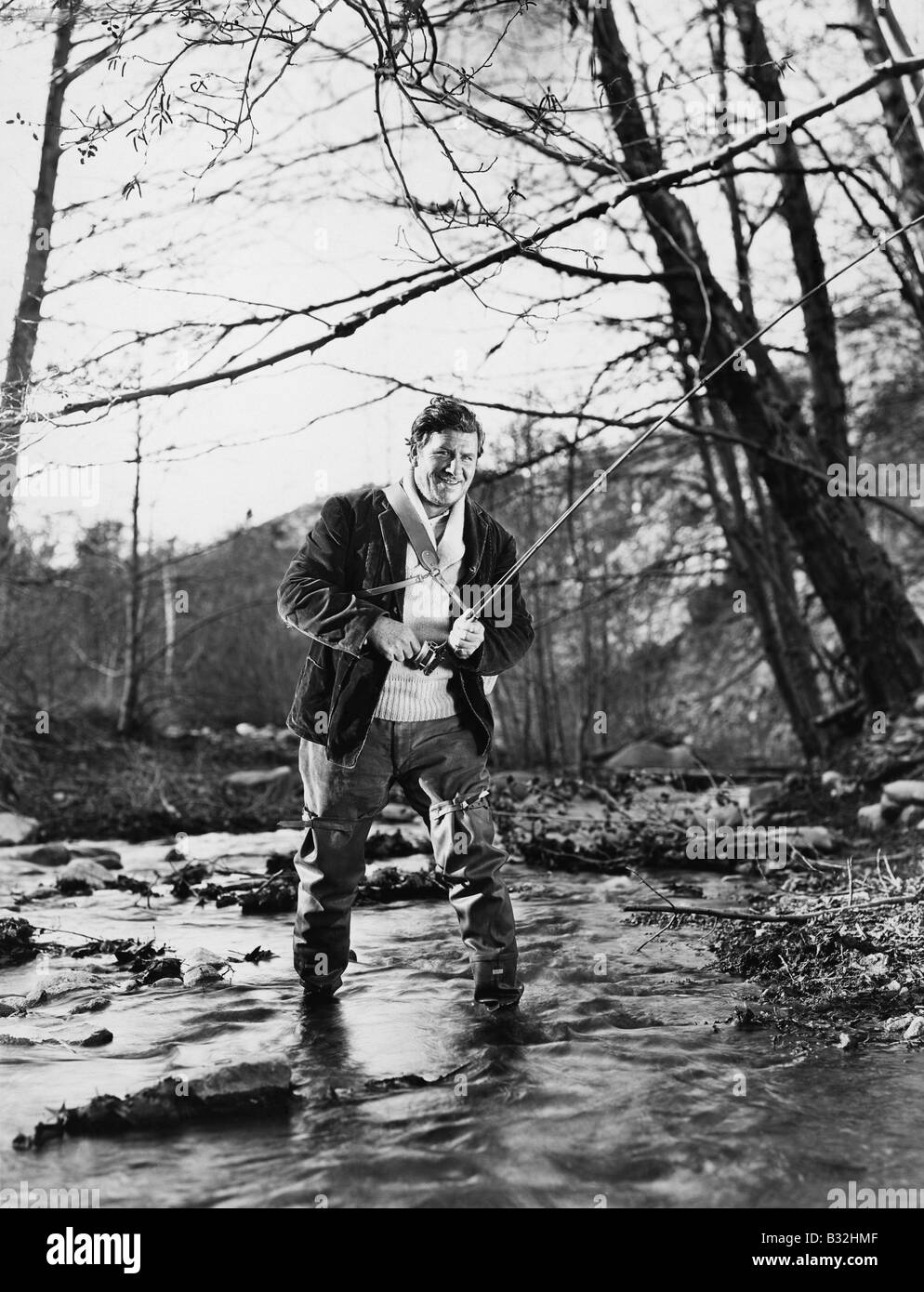 REEL IT IN Stock Photo - Alamy