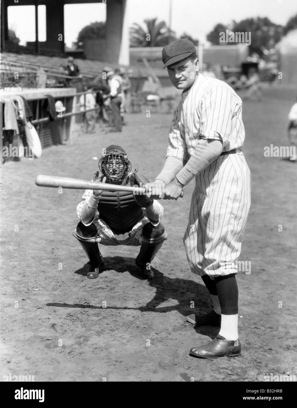 Young man practicing baseball batting hi-res stock photography and ...