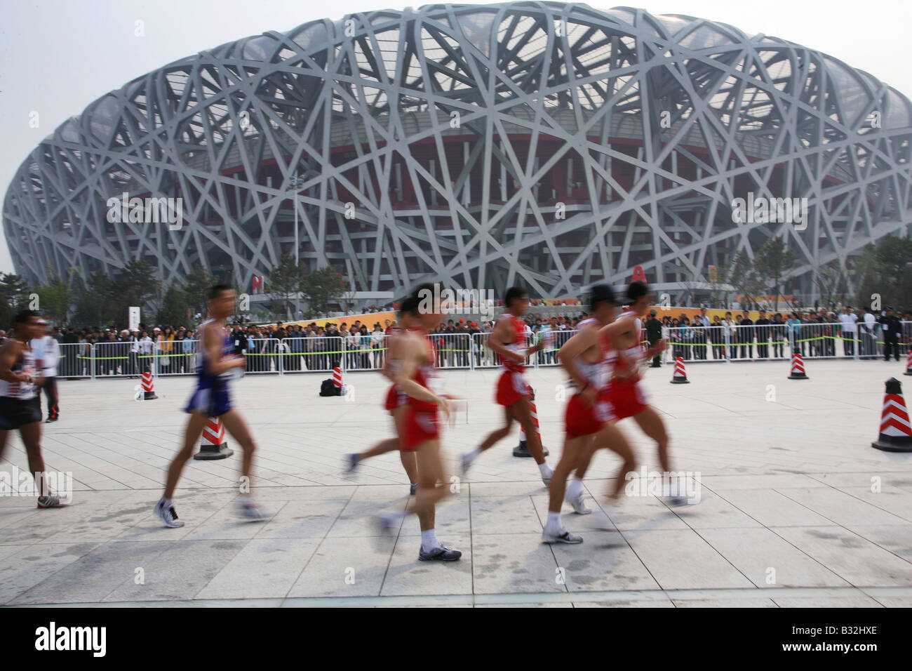 Athlete Running In Front of National Stadium,Beijing,China Stock Photo ...