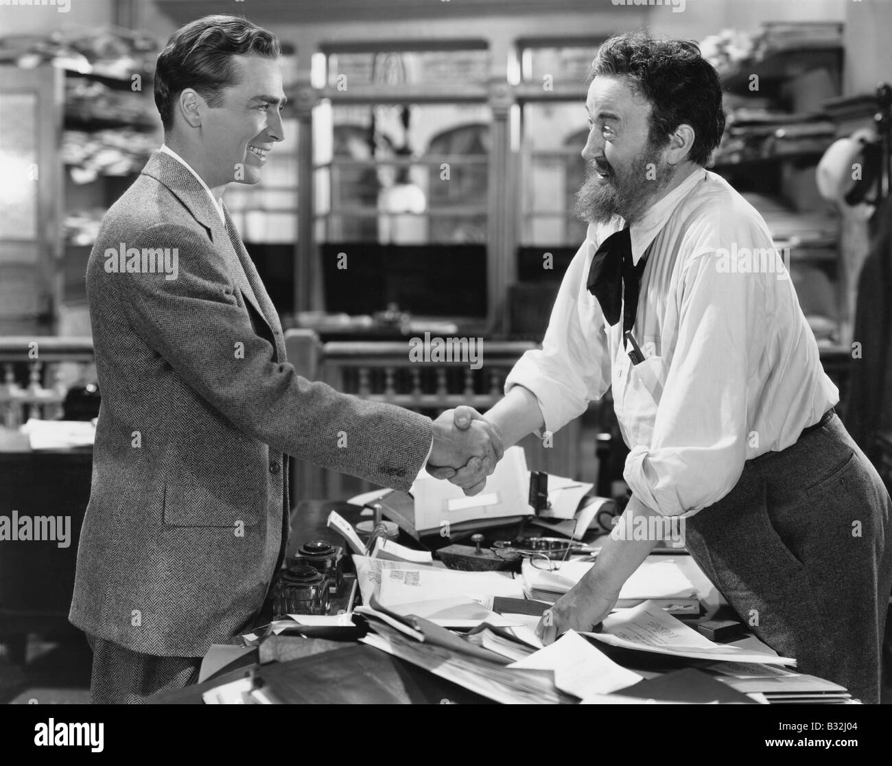 Happy business handshake Black and White Stock Photos & Images - Alamy