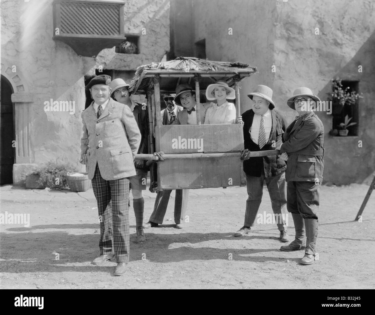 Rich man carried Black and White Stock Photos & Images - Alamy