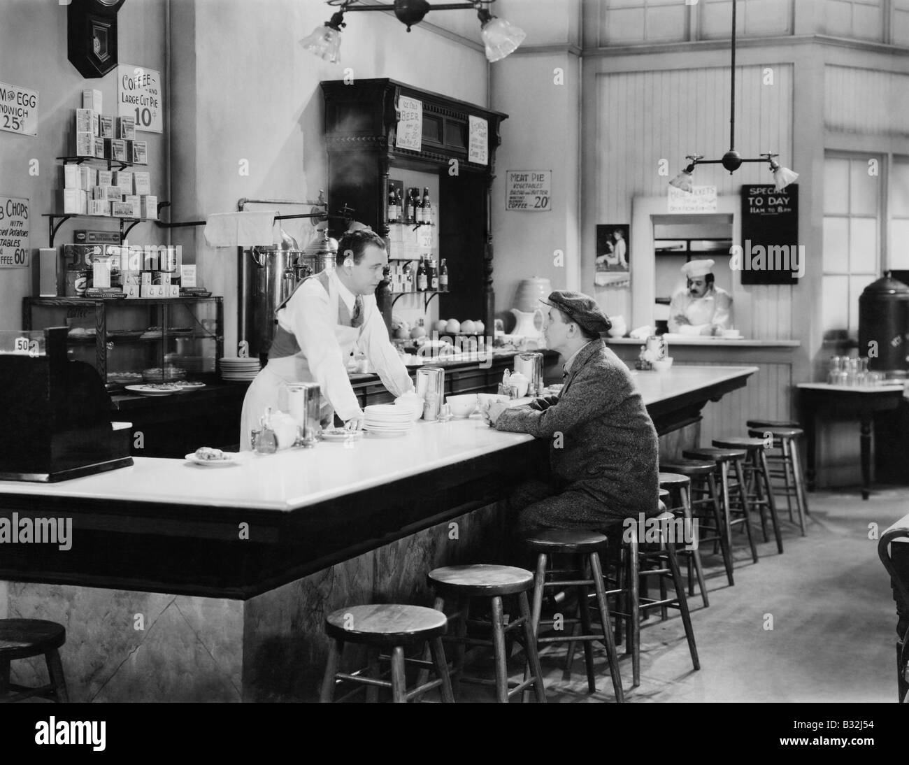 Young waiter taking orders hi-res stock photography and images - Alamy