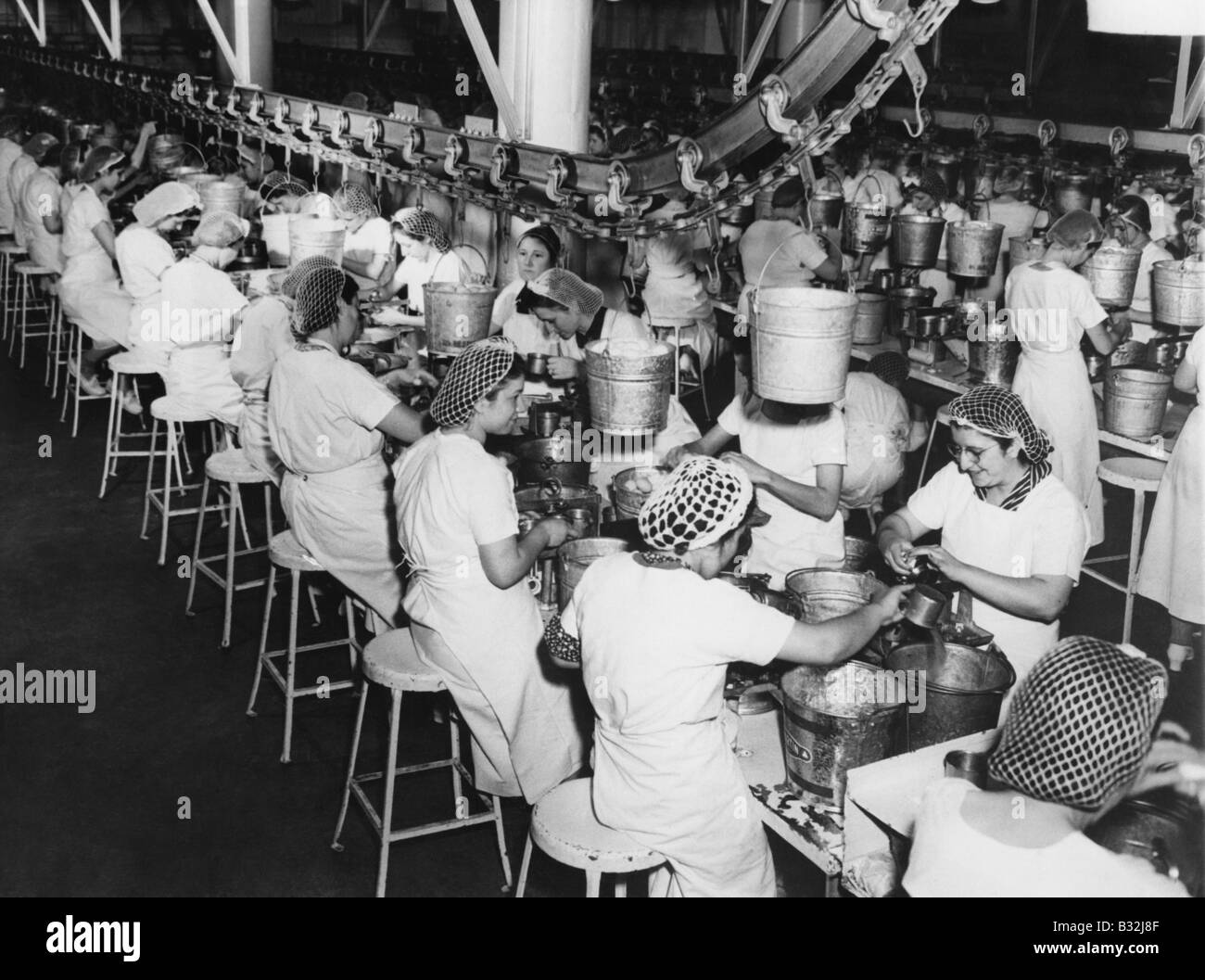 Food production workers Black and White Stock Photos & Images - Alamy