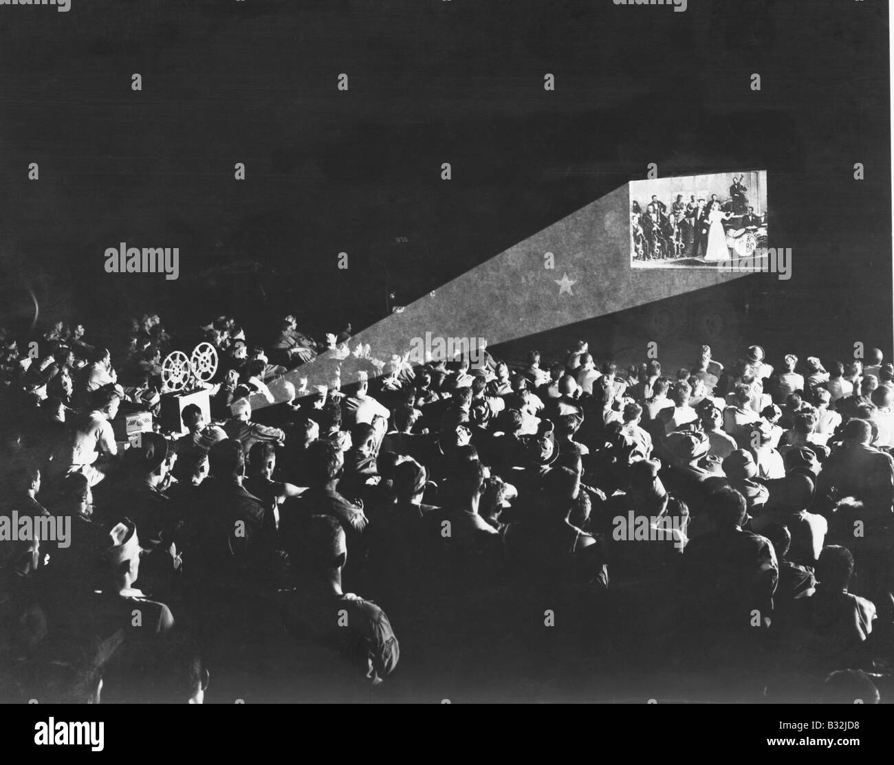 Crowd watching big screen Black and White Stock Photos & Images - Alamy