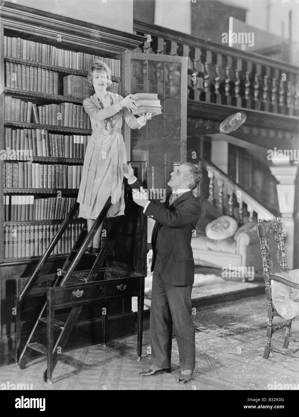 Picking out books Stock Photo - Alamy