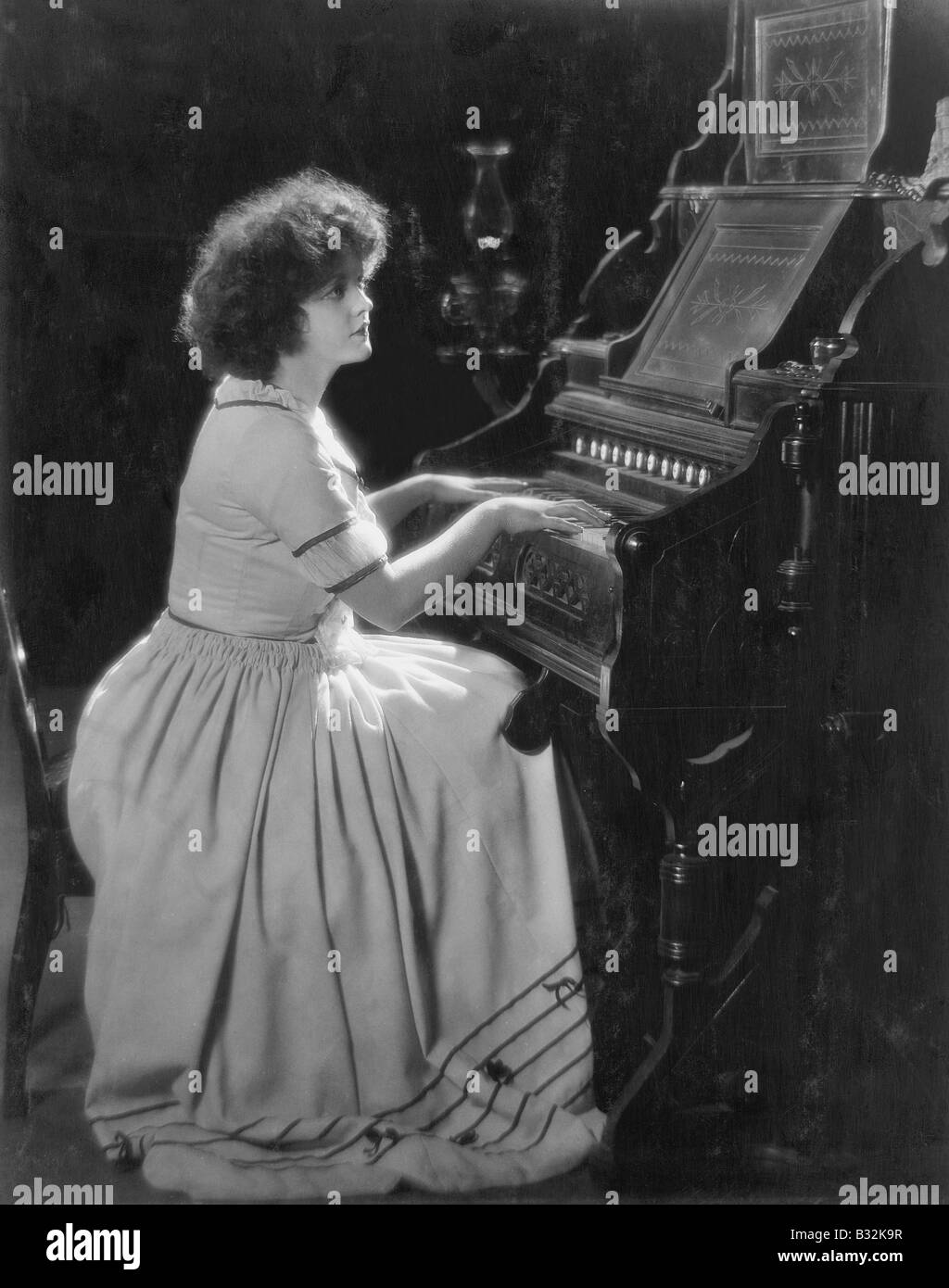 Music instruments organ playing Black and White Stock Photos & Images ...