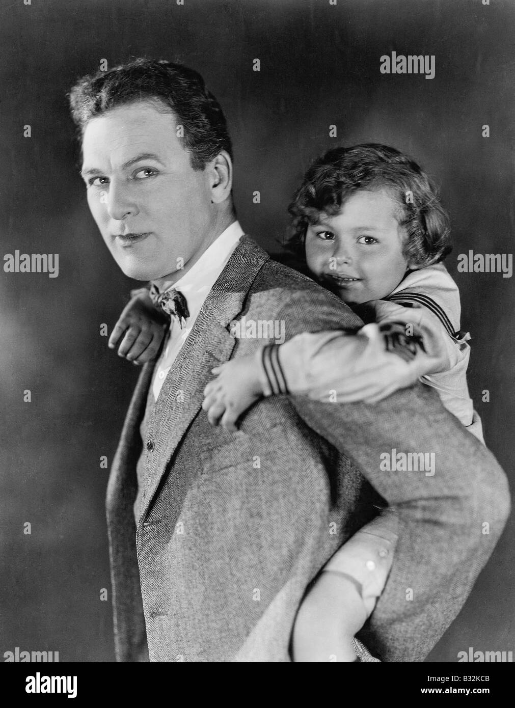 Affection father son piggyback Black and White Stock Photos & Images ...