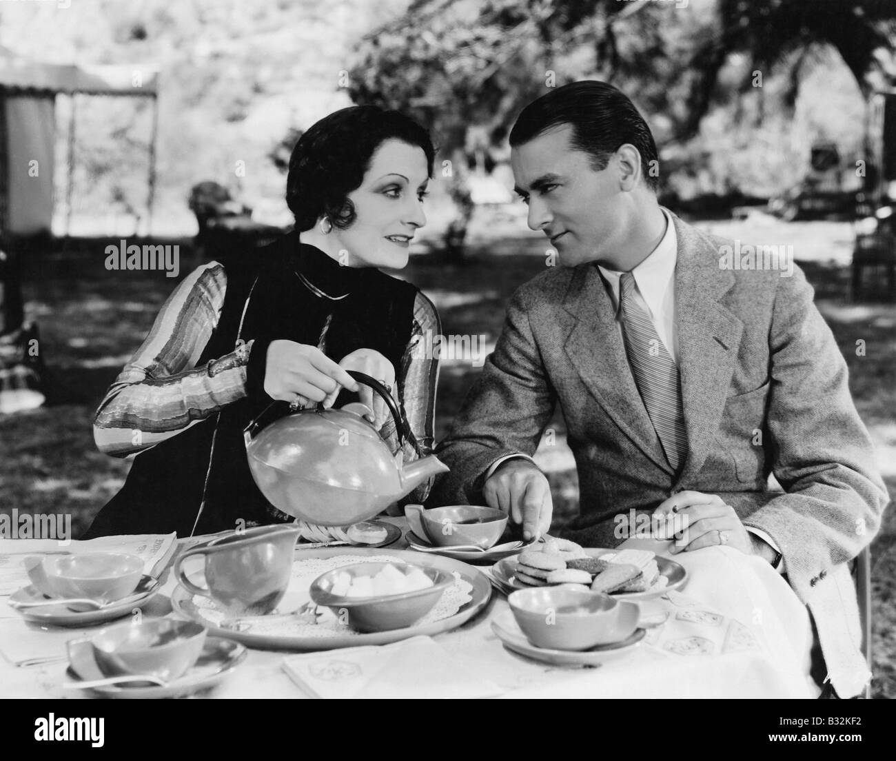 Young couple talking drinking beverages hi-res stock photography and ...