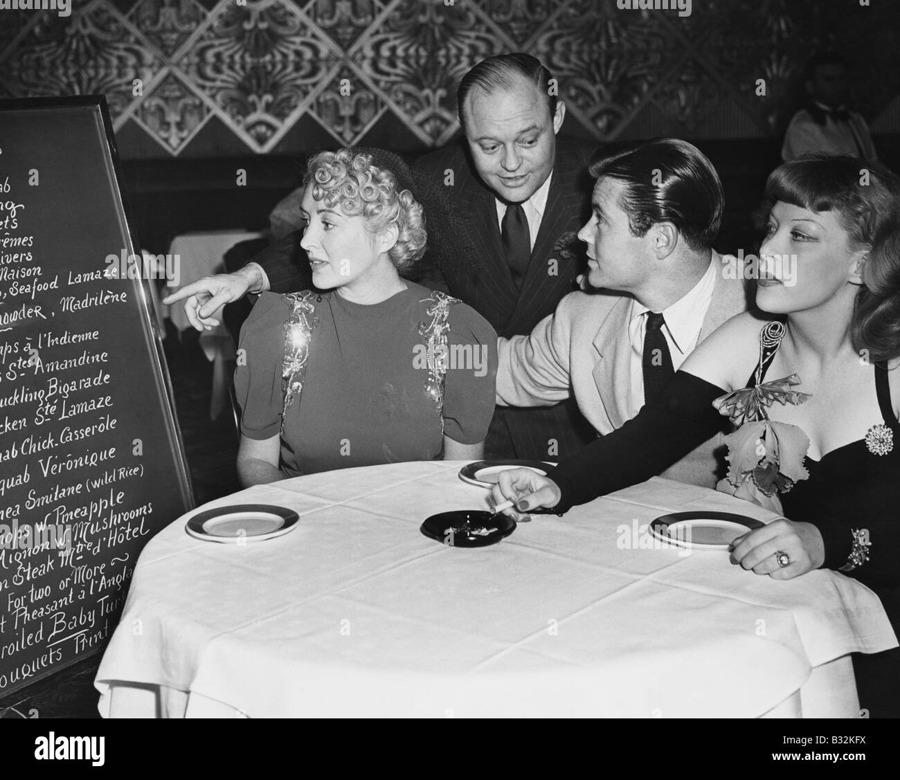 Man restaurant menu in Black and White Stock Photos & Images - Alamy
