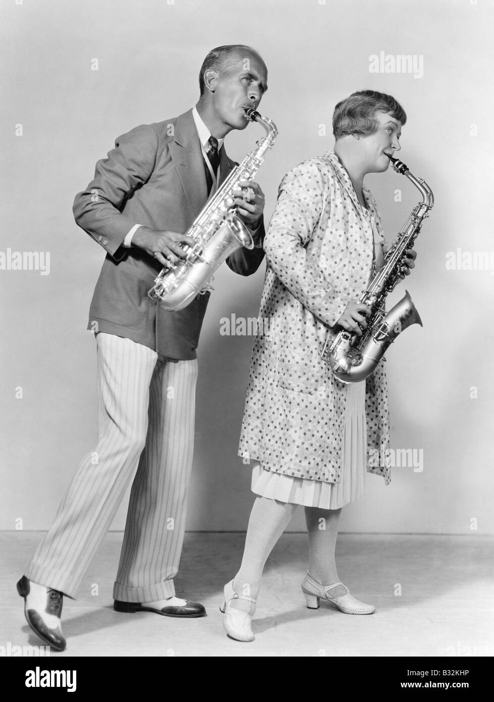 Couple playing musical instruments hi-res stock photography and images ...