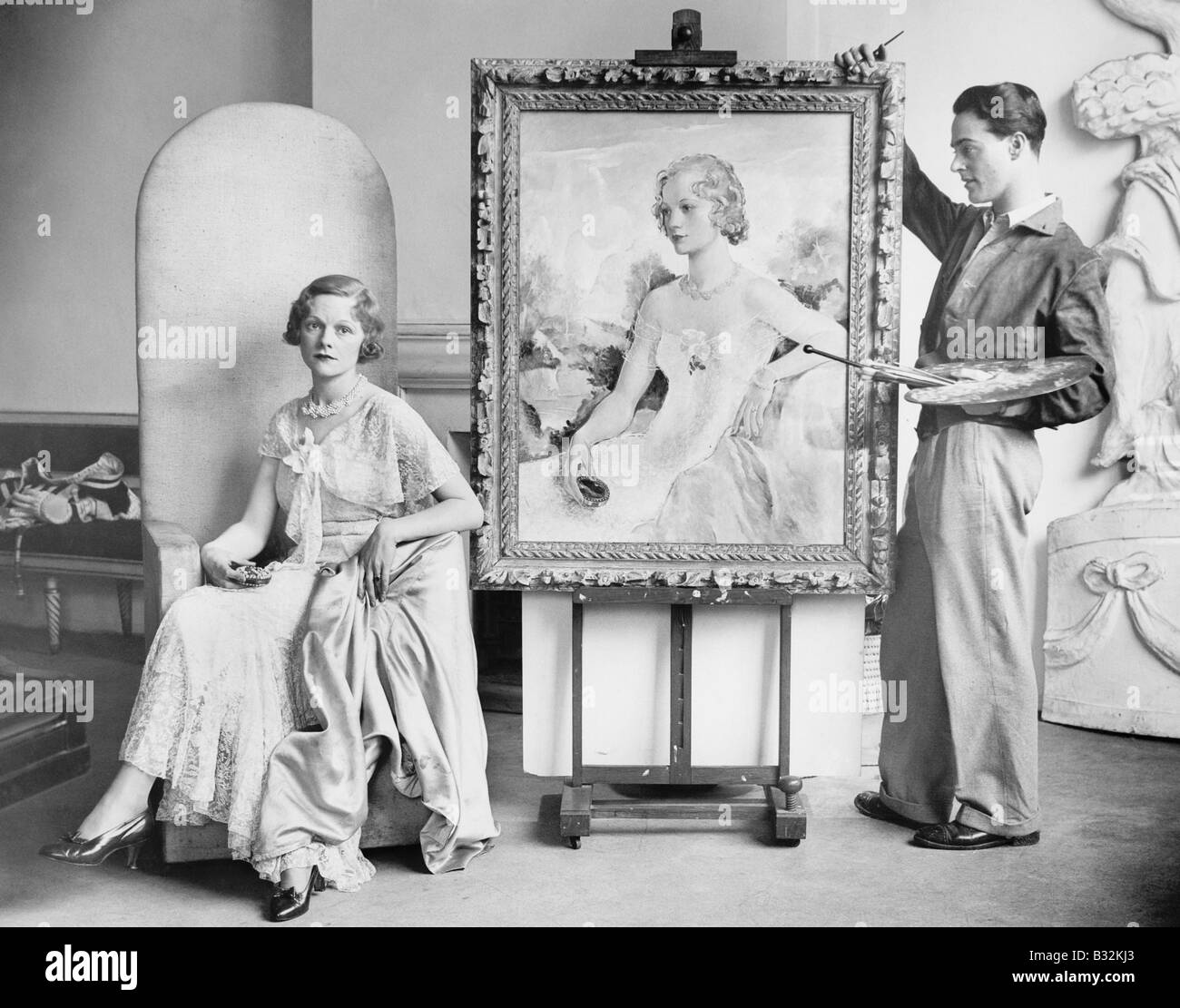 Artist painting portrait of posing woman Stock Photo - Alamy
