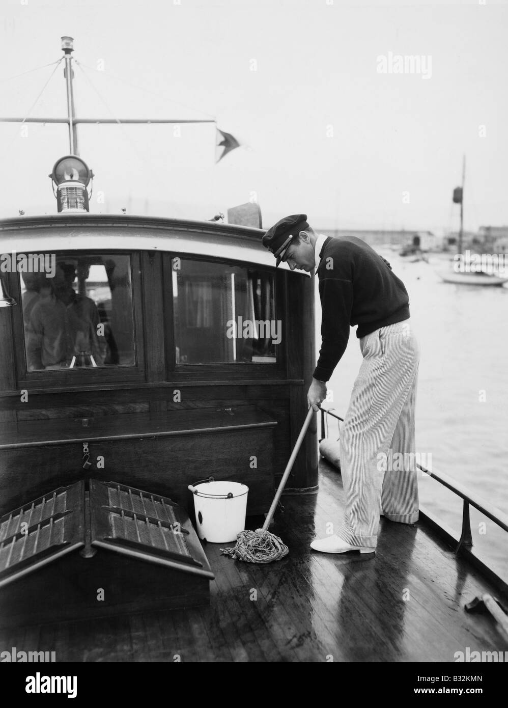 Sailors swabbing the deck hi-res stock photography and images - Alamy