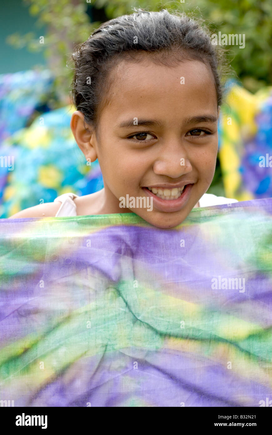 girl with tie dye pareu cloth on Atiu Cook Islands Stock Photo - Alamy
