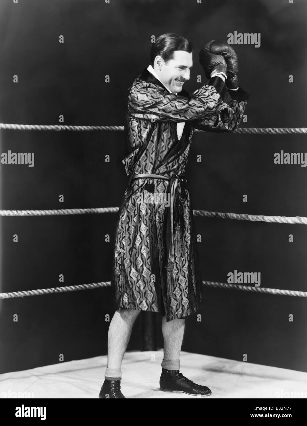 Victorious boxer in ring Stock Photo - Alamy