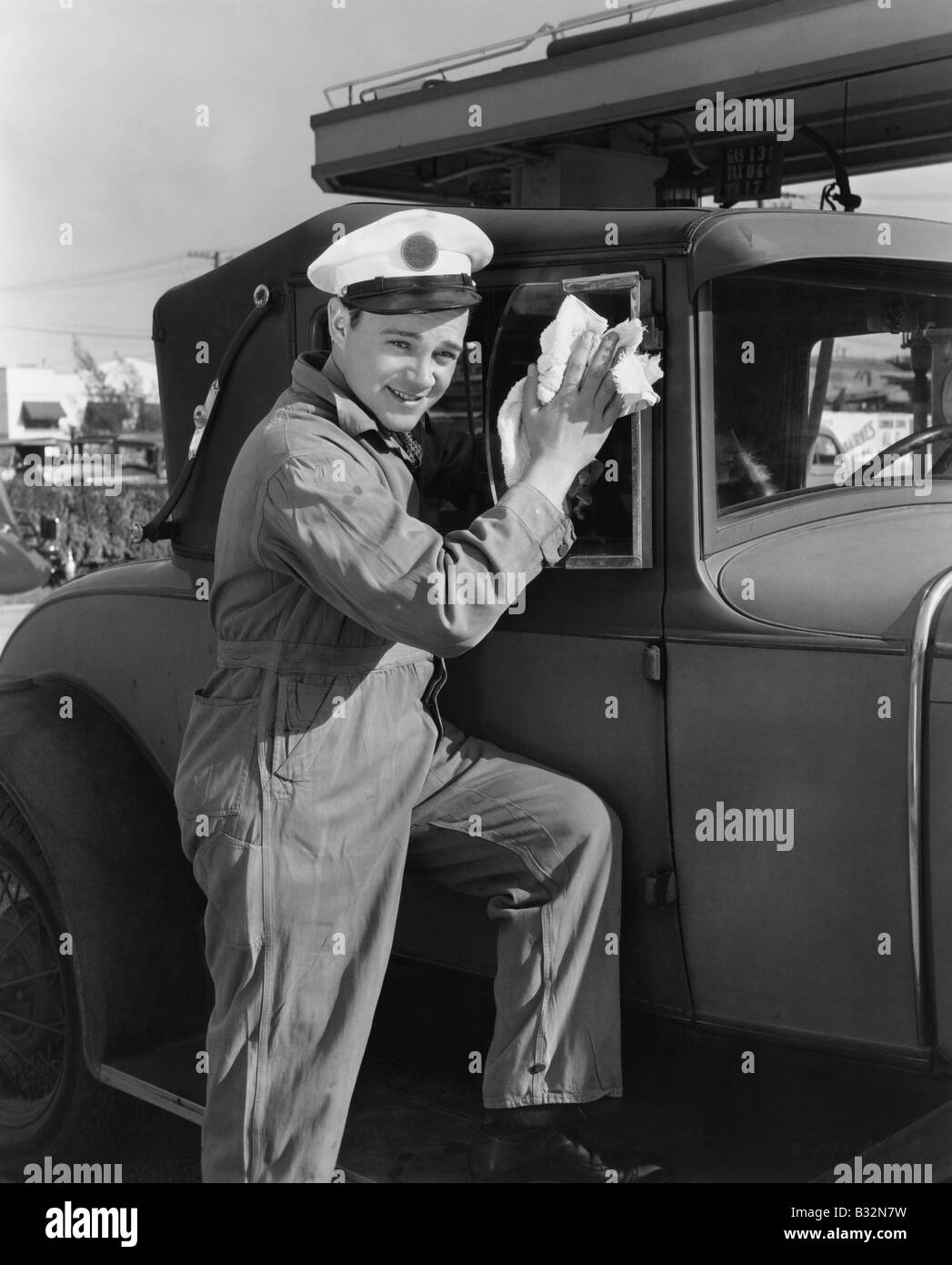 Man wash car Black and White Stock Photos & Images - Alamy